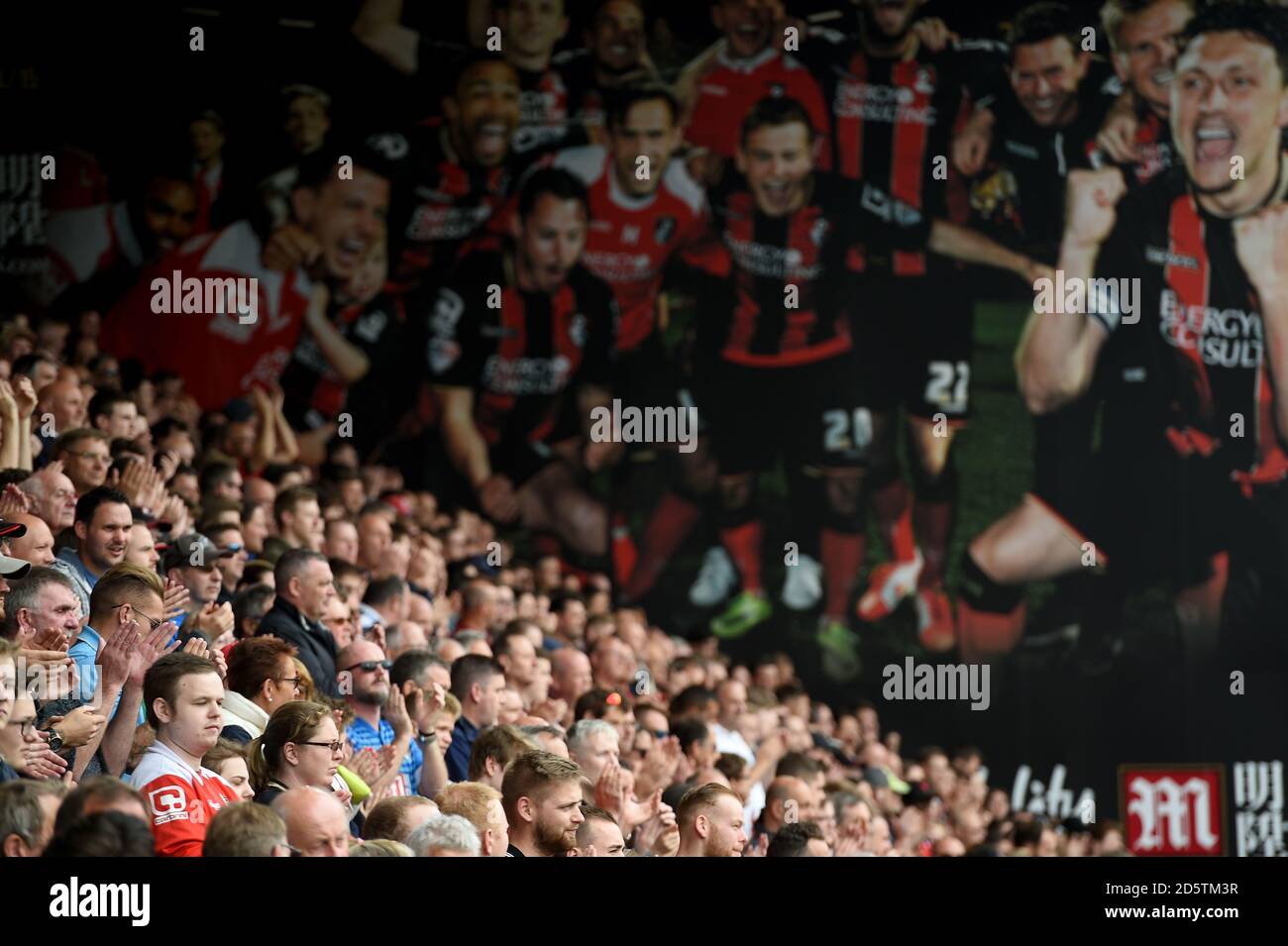 Bournemouth fans in the stands Stock Photo - Alamy