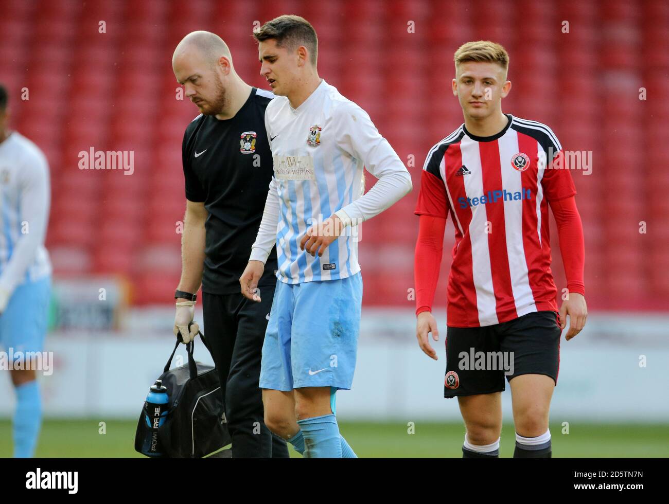 Coventry City U18's Tom Baylis takes a knock Stock Photo - Alamy