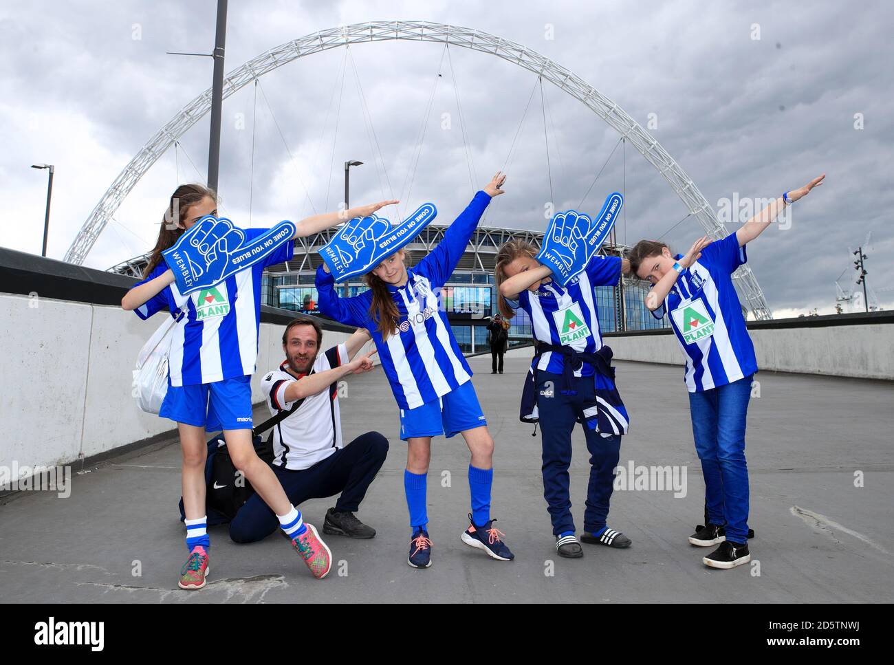 Birmingham City fans pose outside the stadium Stock Photo - Alamy