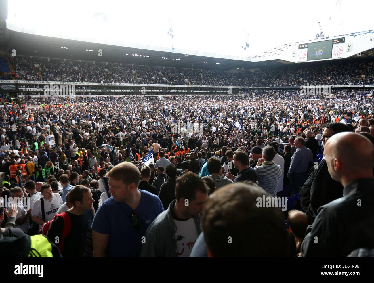 Fans invade the pitch at White Hart Lane after the final game played ...
