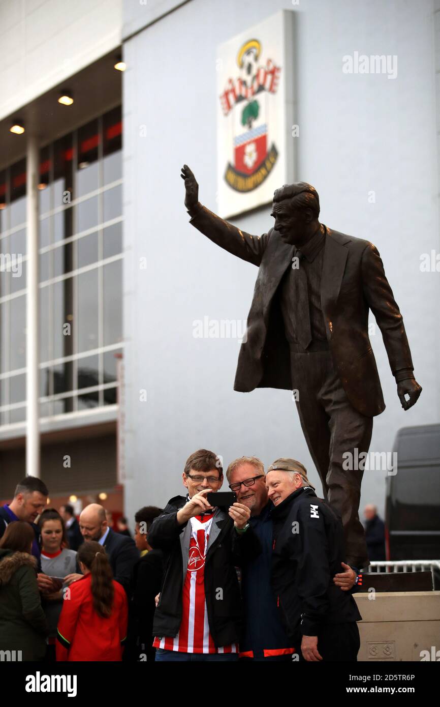 Fans pose for a picture in front of the Edric Thornton "Ted" Bates ...