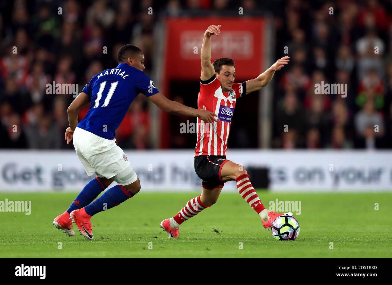 Manchester United's Anthony Martial (left) and Southampton's Cedric ...