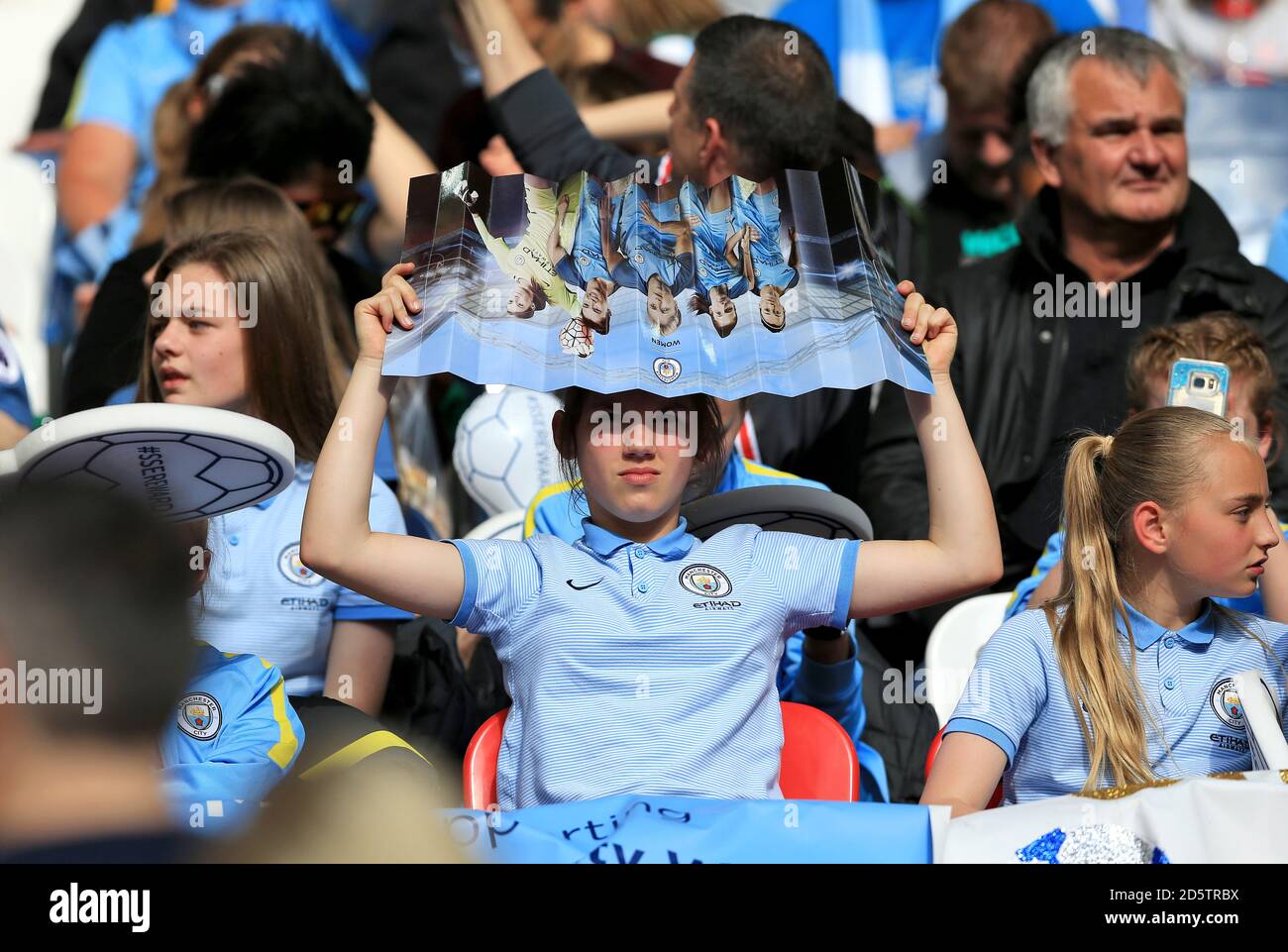 Manchester City Ladies fans in the stands Stock Photo - Alamy