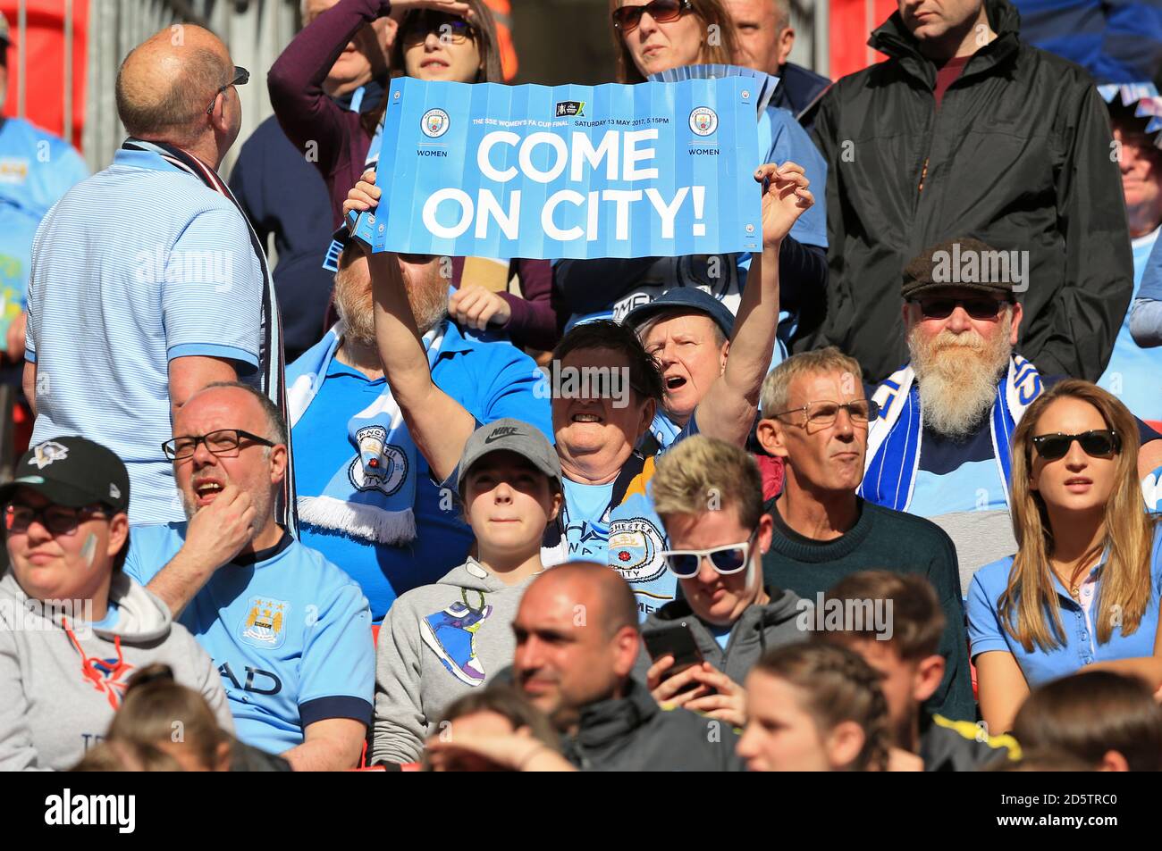 Manchester City Ladies fans in the stands Stock Photo - Alamy