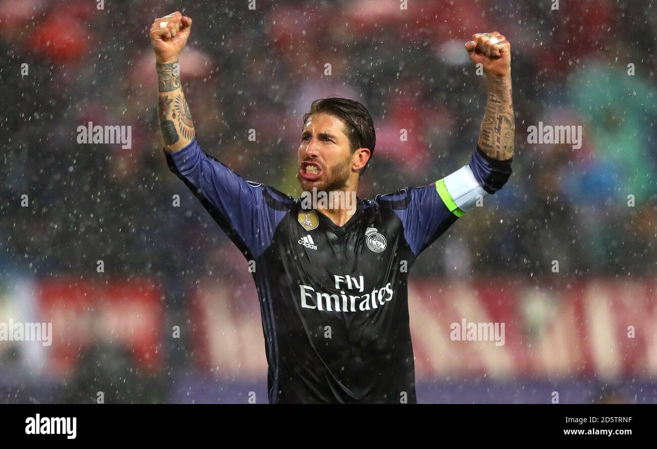 Real Madrid's Sergio Ramos celebrates in the rain after the game Stock ...