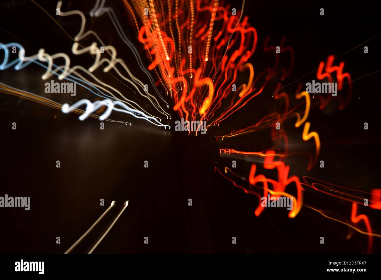 Colorful street lights by night. Blurred city lights at night. Dizzy ...