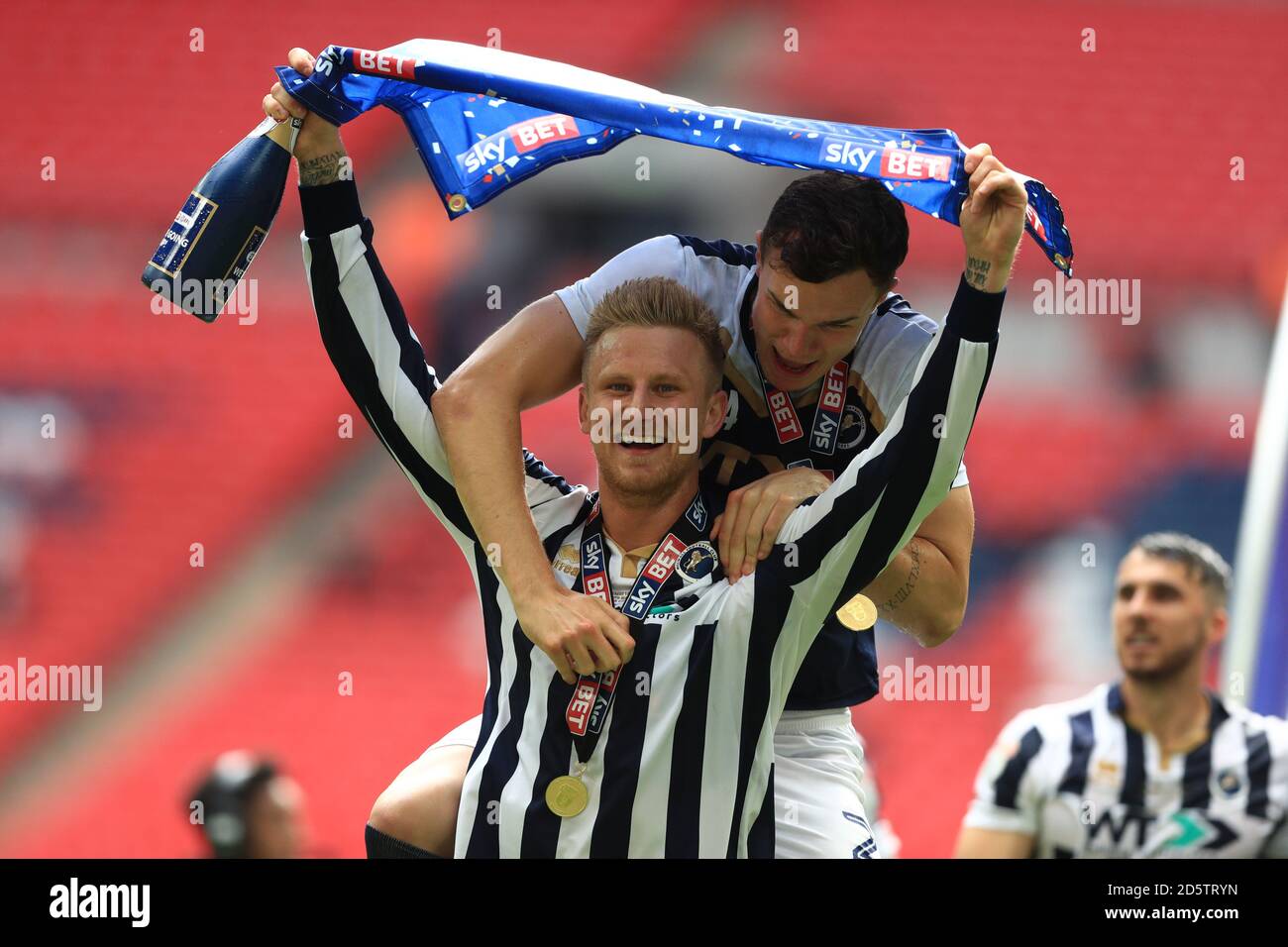 Millwall's Byron Webster celebrates promotion Stock Photo - Alamy