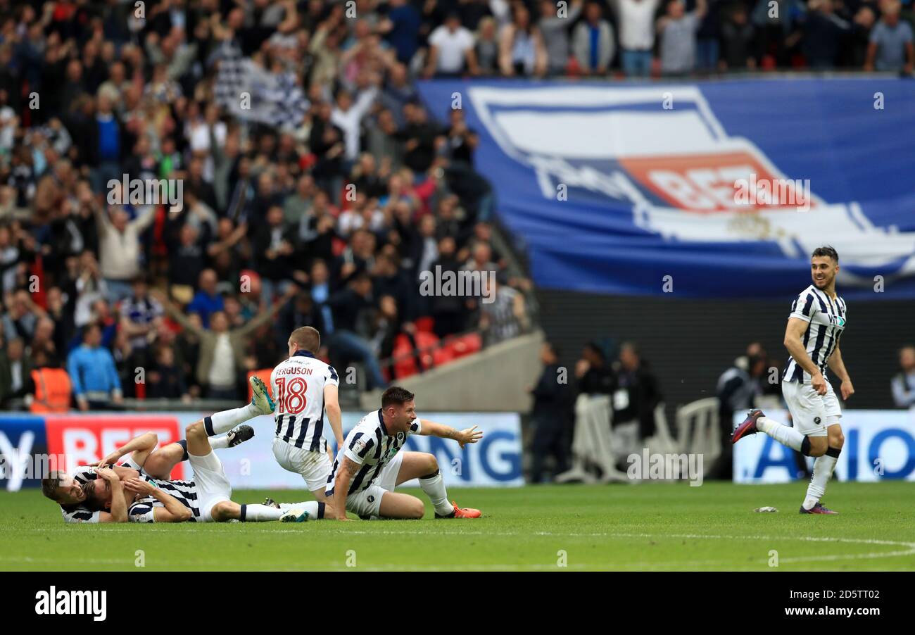 Millwall players celebrate after the final whistle Stock Photo - Alamy