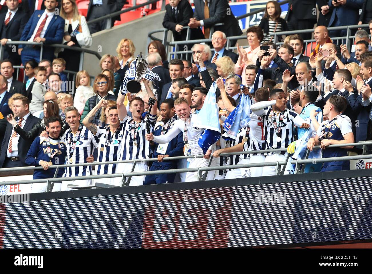 Millwall's Tony Craig lifts the Sky Bet League One play off final ...