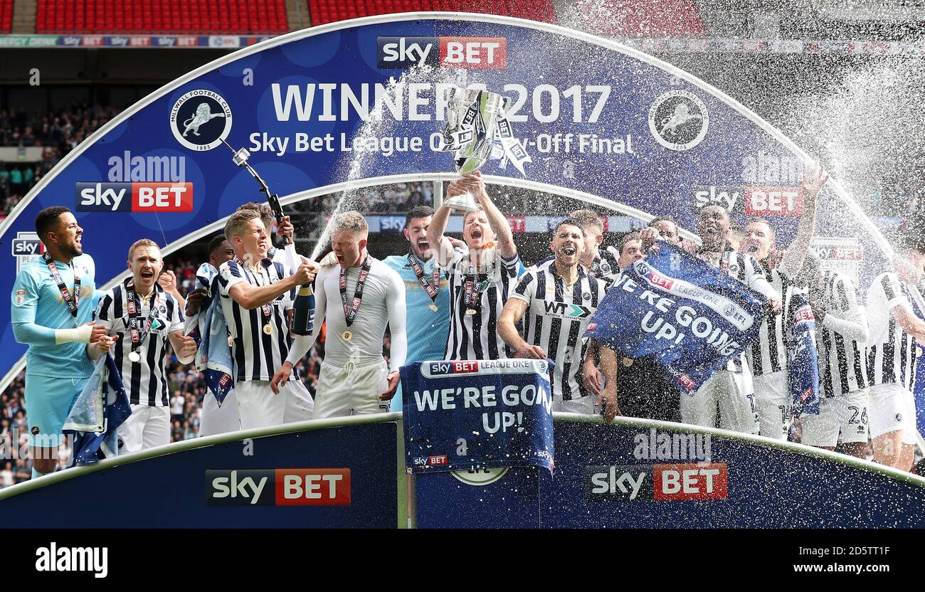 Millwall players celebrate with the trophy after the game Stock Photo ...