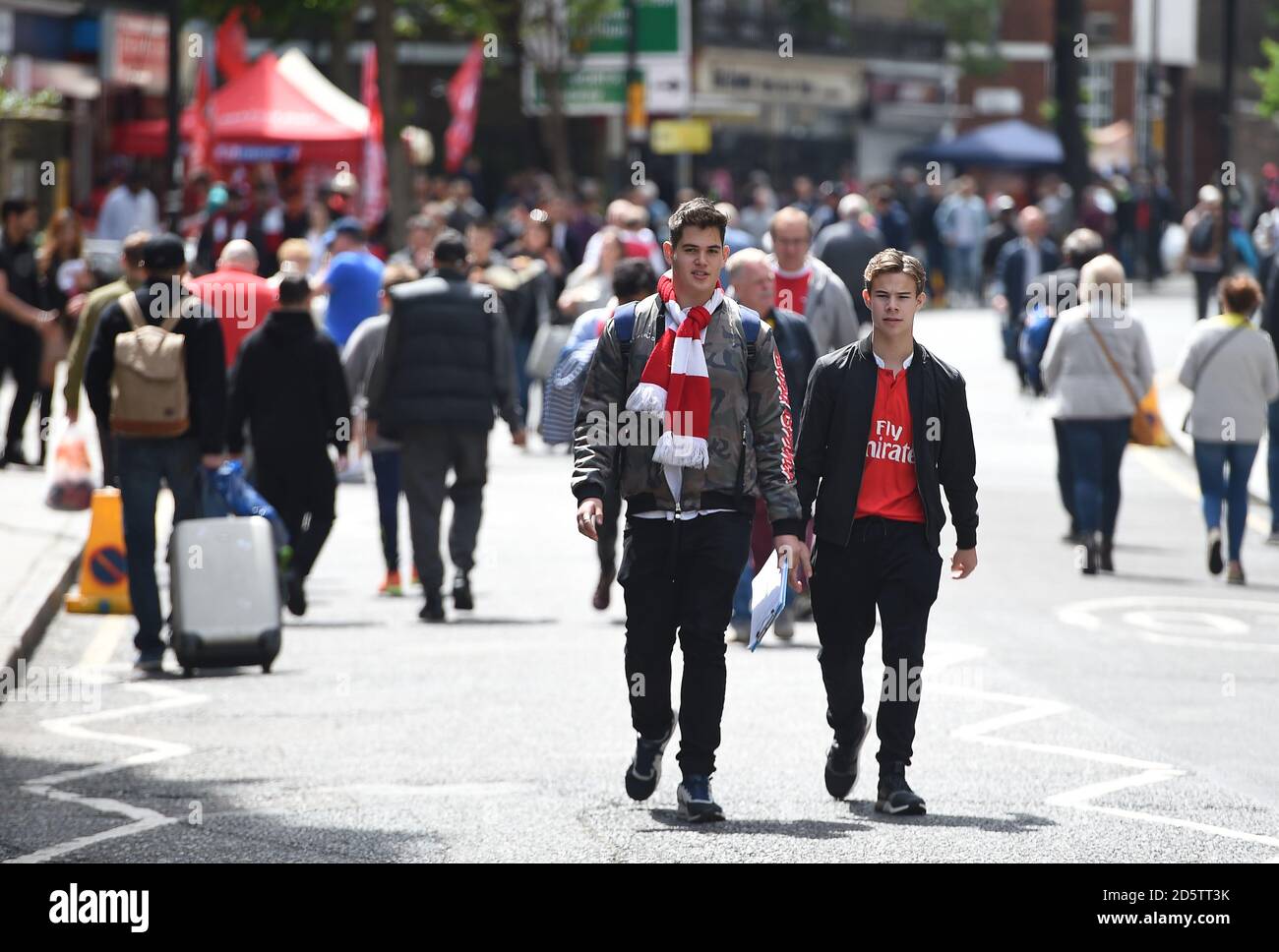 A general view of fans outside Emirates Stadium Stock Photo - Alamy