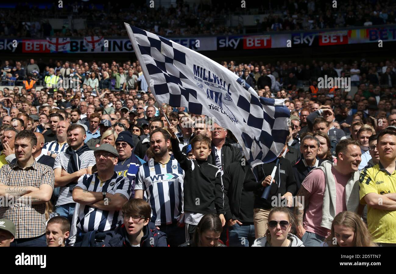 Millwall fans waving a flag in the stands Stock Photo - Alamy