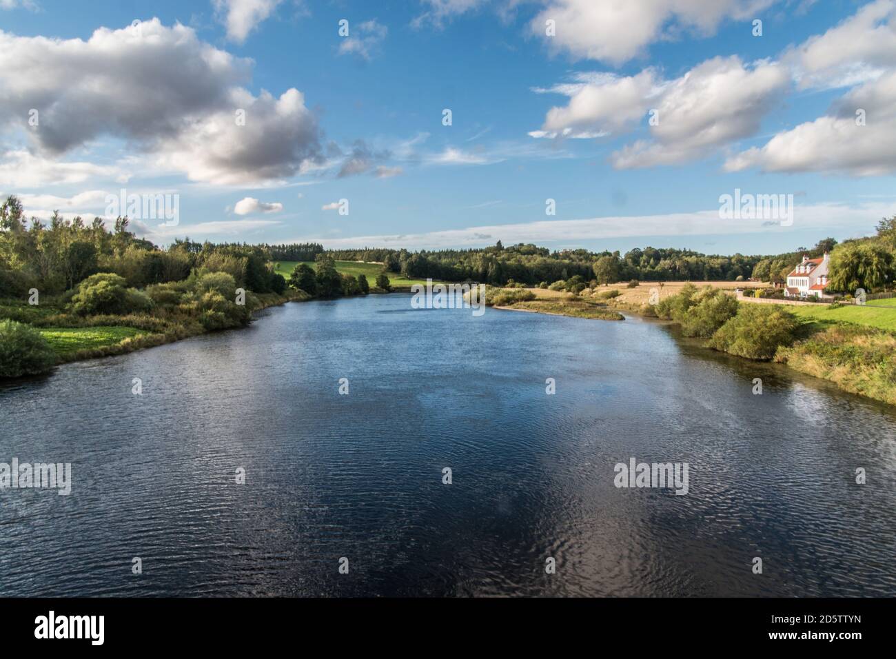 Union Bridge, a 200 year old chain bridge, spans the River Tweed ...