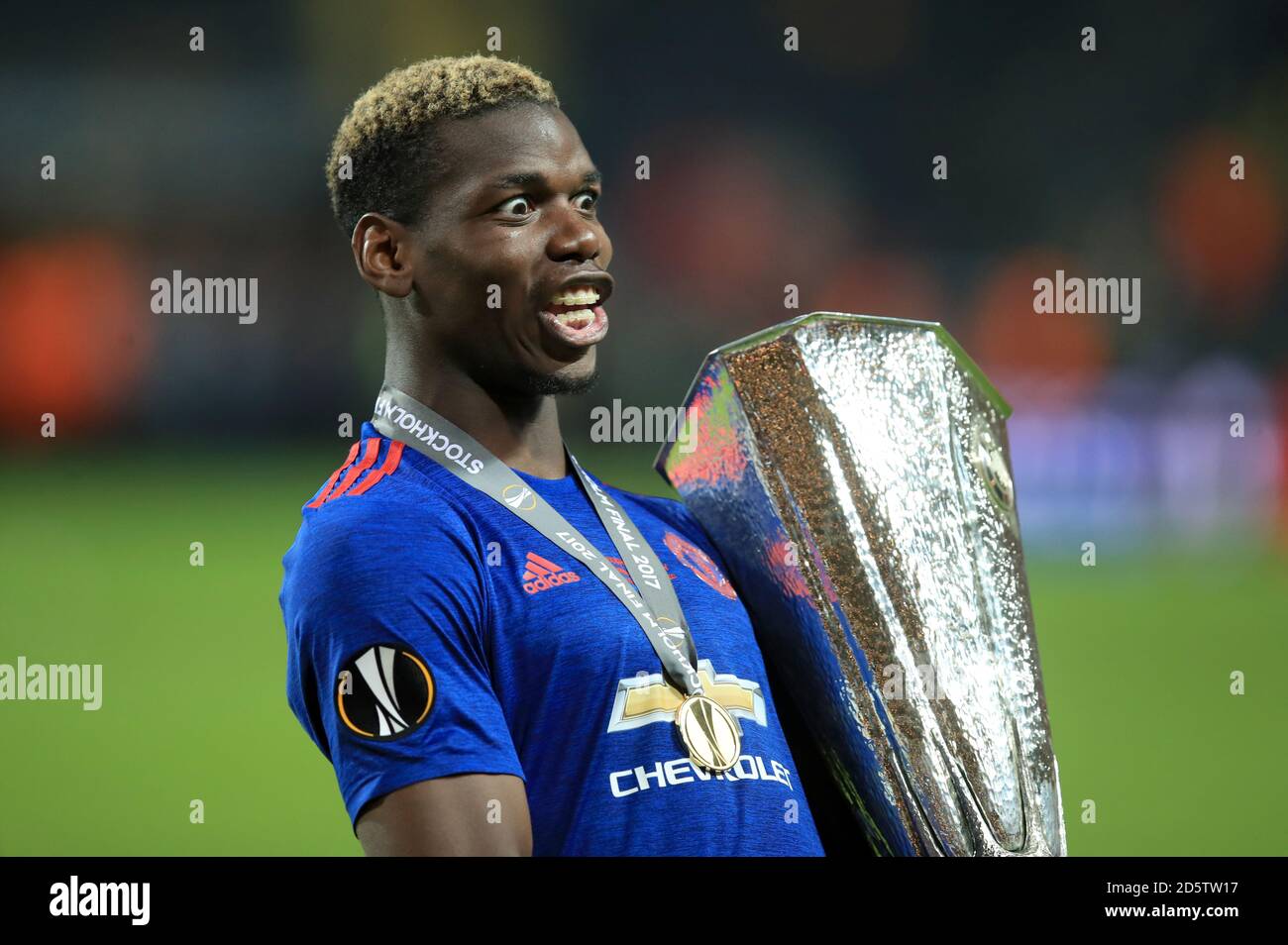 Manchester United's Paul Pogba celebrates with the trophy after winning ...