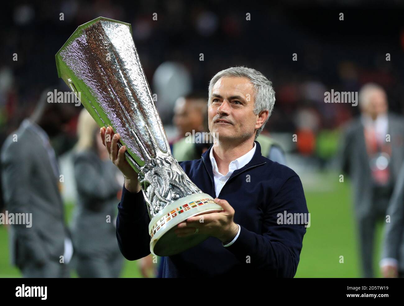 Manchester United manager Jose Mourinho celebrates with the trophy ...