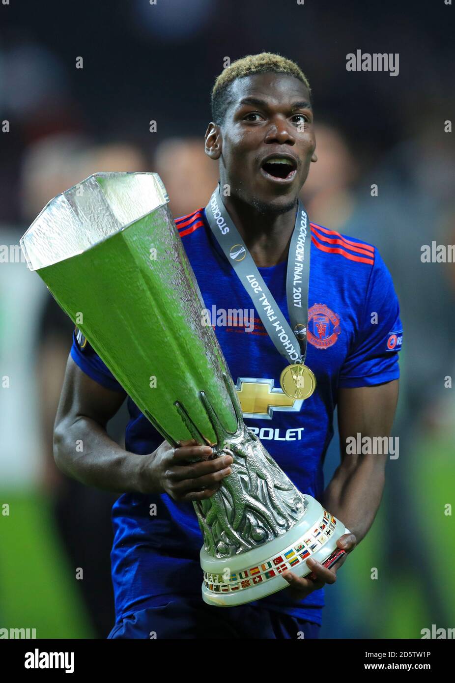 Manchester United's Paul Pogba celebrates with the trophy after winning ...