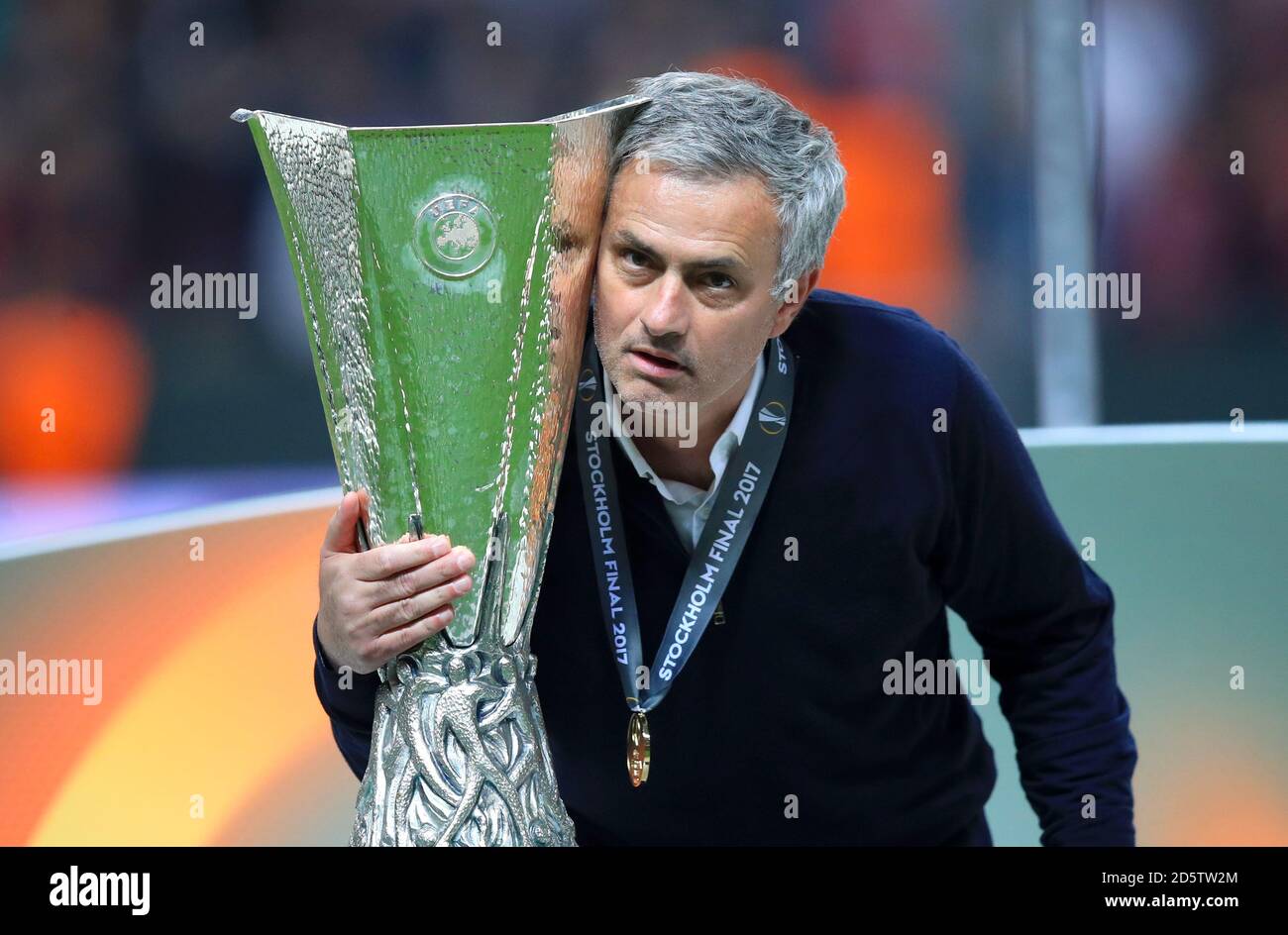 Manchester United manager Jose Mourinho celebrates with the trophy ...