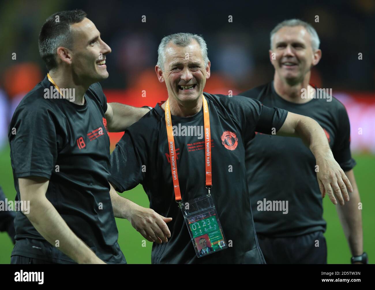 Manchester United staff Ian Buckingham and Mark Ferendenus celebrate ...