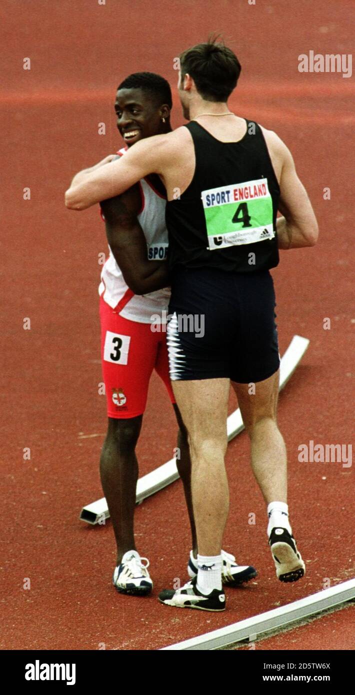 Dwain Chambers, Left, is congratulated by Jamie Henthorn after his win ...