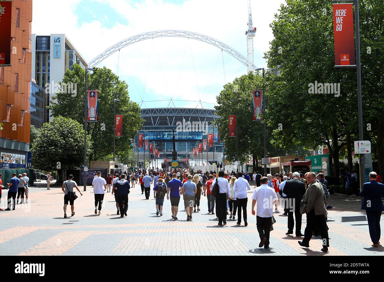 Fans make their way down Wembley Way ahead of the match Stock Photo - Alamy