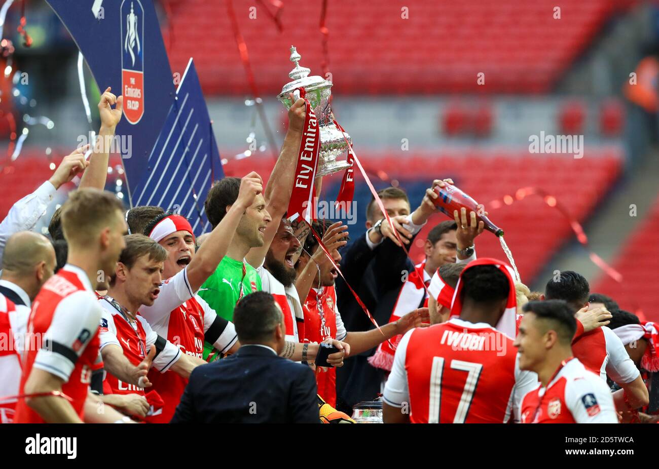 Arsenal players celebrate with the trophy after winning the FA Cup ...