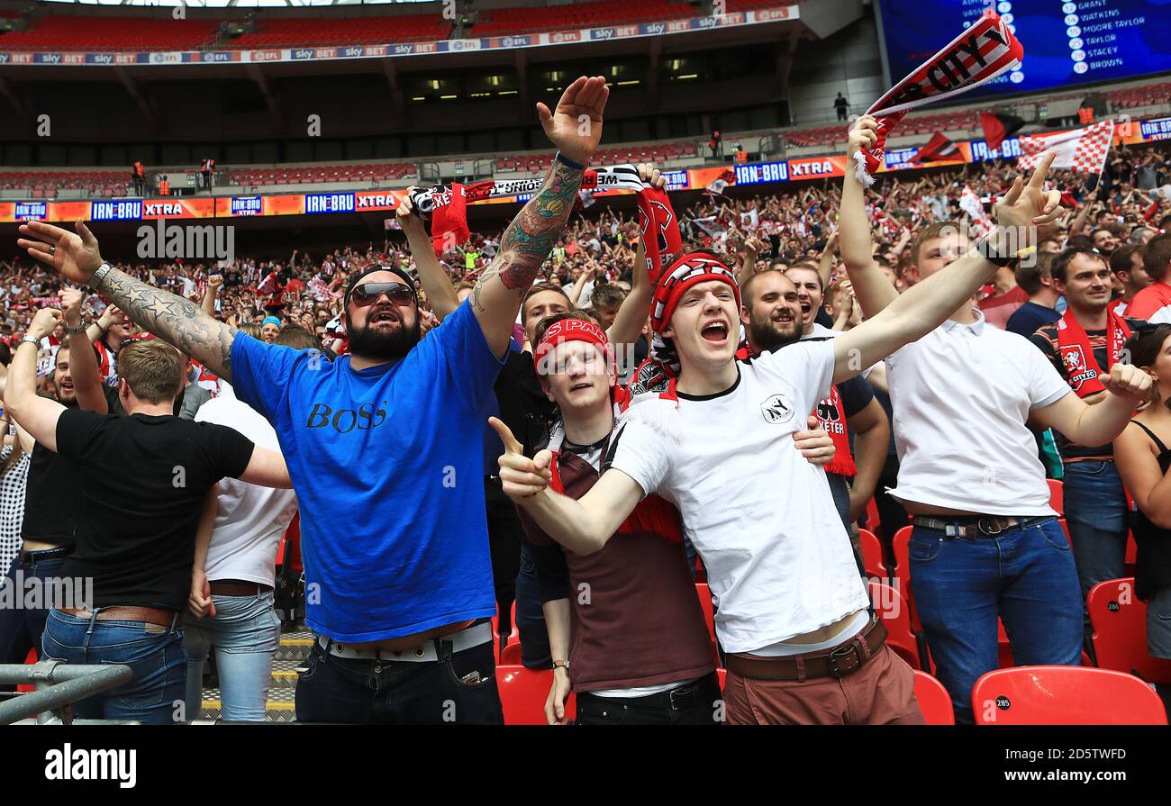 Exeter City fans show their support in the stands Stock Photo - Alamy