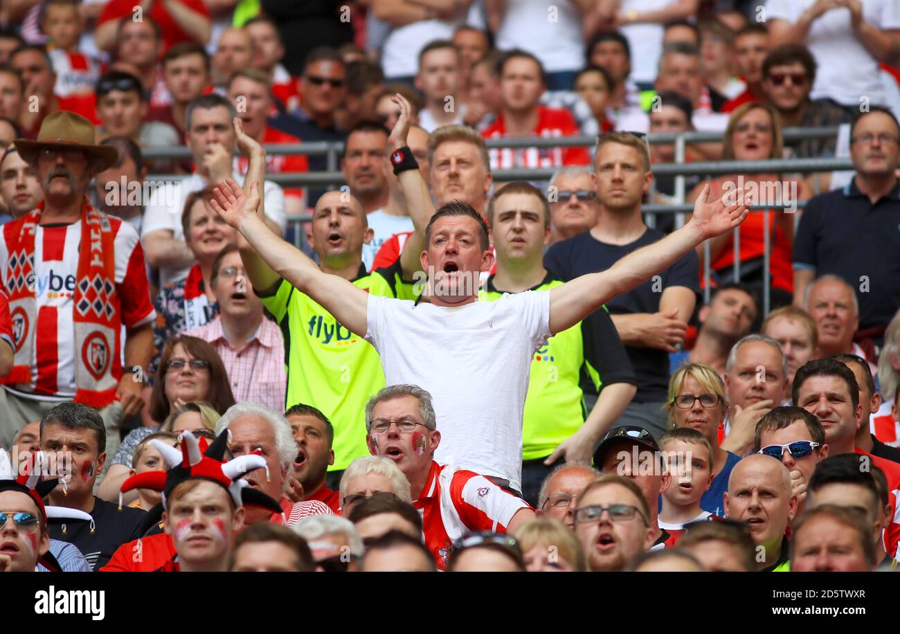 Exeter City fans in the stands Stock Photo - Alamy