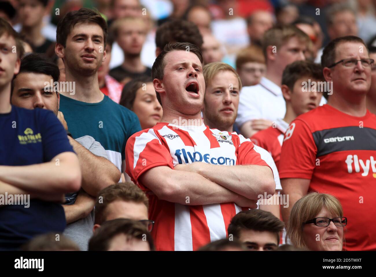 Exeter City fans in the stands Stock Photo - Alamy