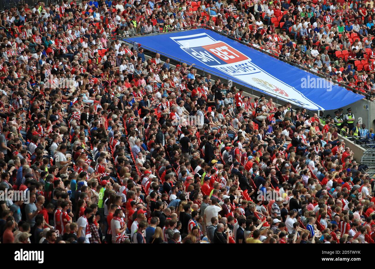 Exeter City fans in the stands Stock Photo - Alamy
