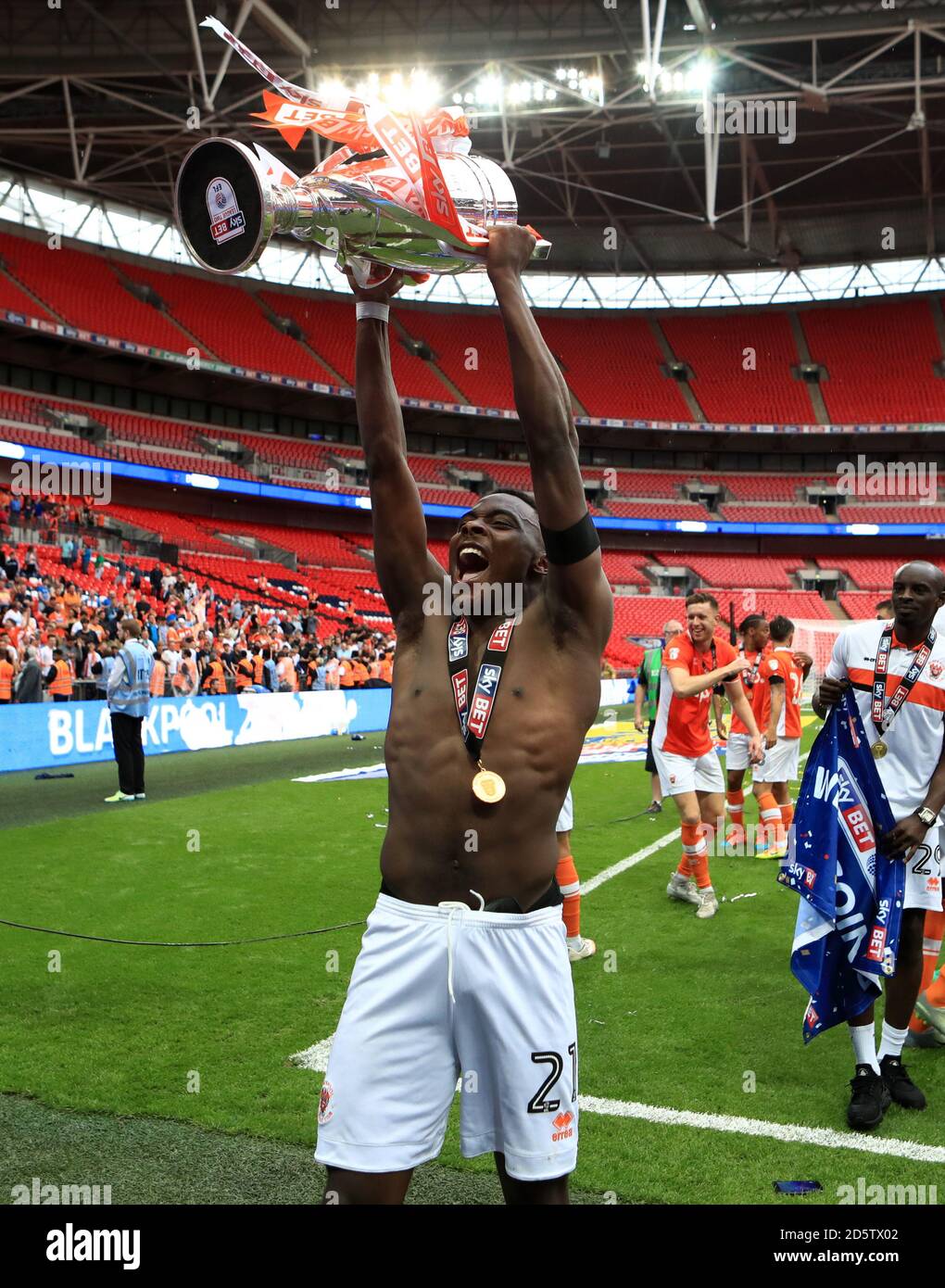 Blackpool's Bright Osayi-Samuel celebrates with the trophy after his ...