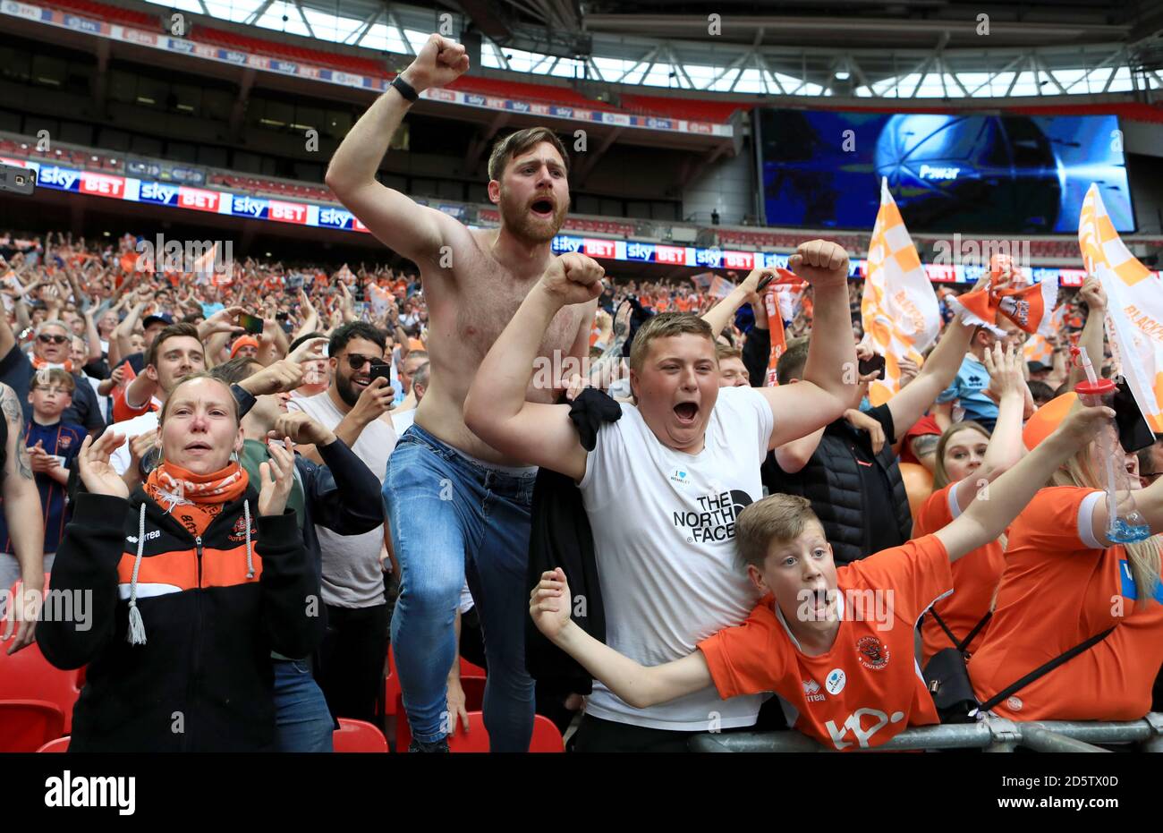 Blackpool fans in the stands Stock Photo - Alamy