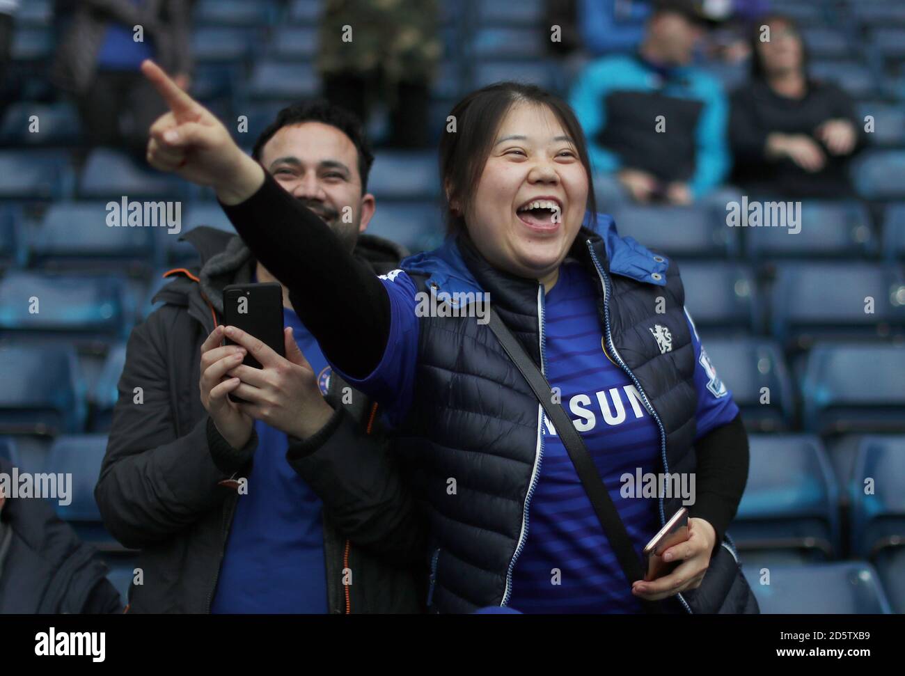 A Chelsea fan in the stands Stock Photo - Alamy
