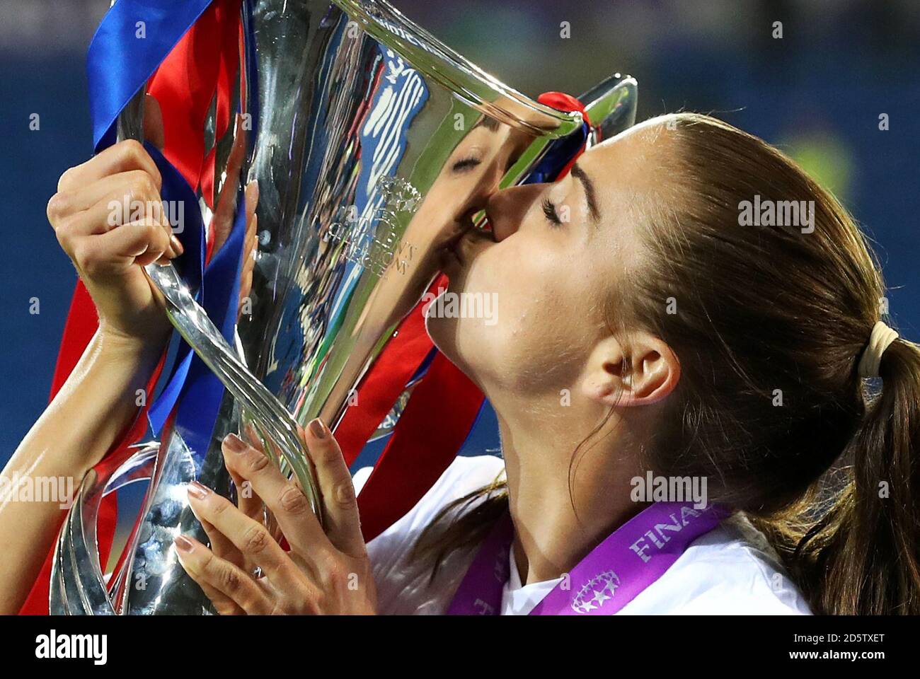 Lyon's Alex Morgan kisses the trophy following the UEFA Women's ...