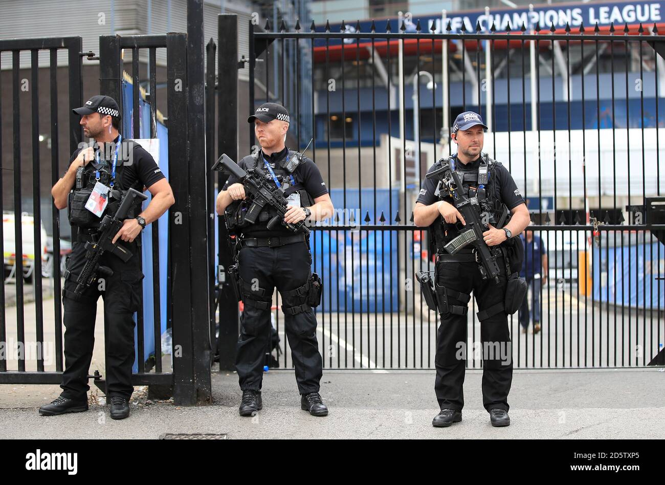 Armed police on patrol outside the stadium prior to the match Stock ...