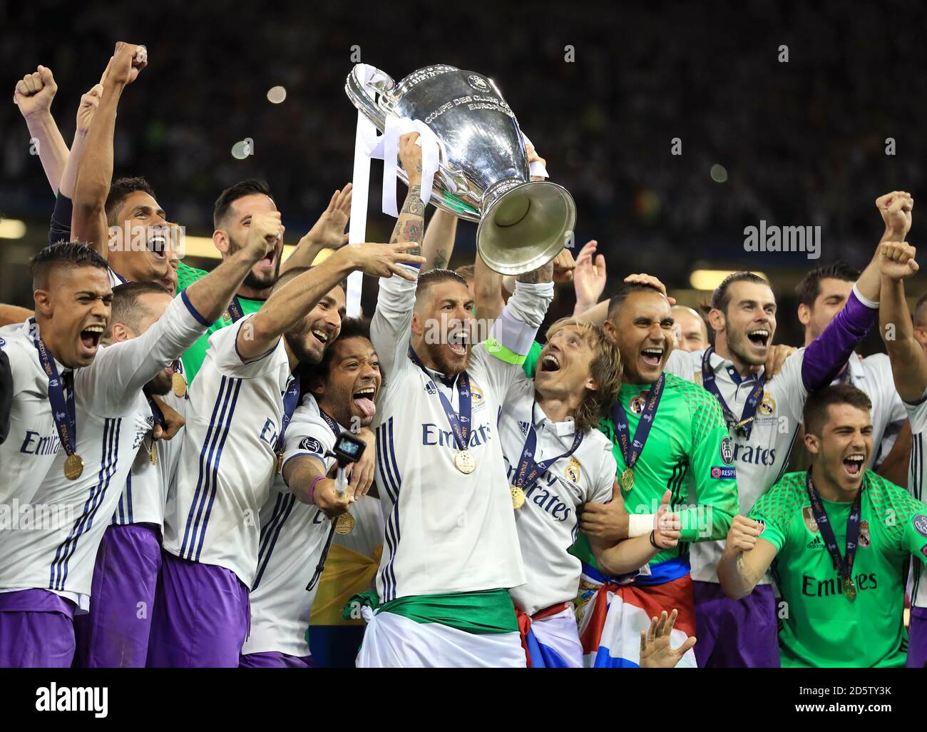 Real Madrid's Sergio Ramos (centre) lifts the trophy after the 2017 ...