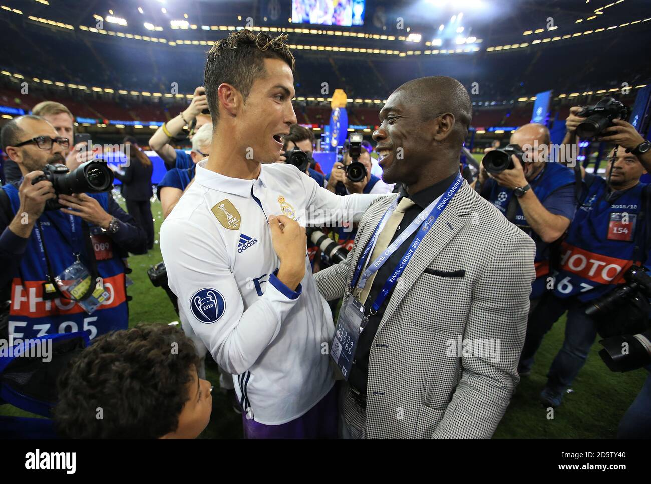 Real Madrid's Cristiano Ronaldo (left) celebrates with Clarence Seedorf ...