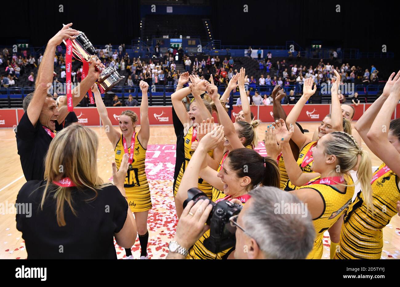 Wasps Netball players celebrate with the Trophy after winning the ...