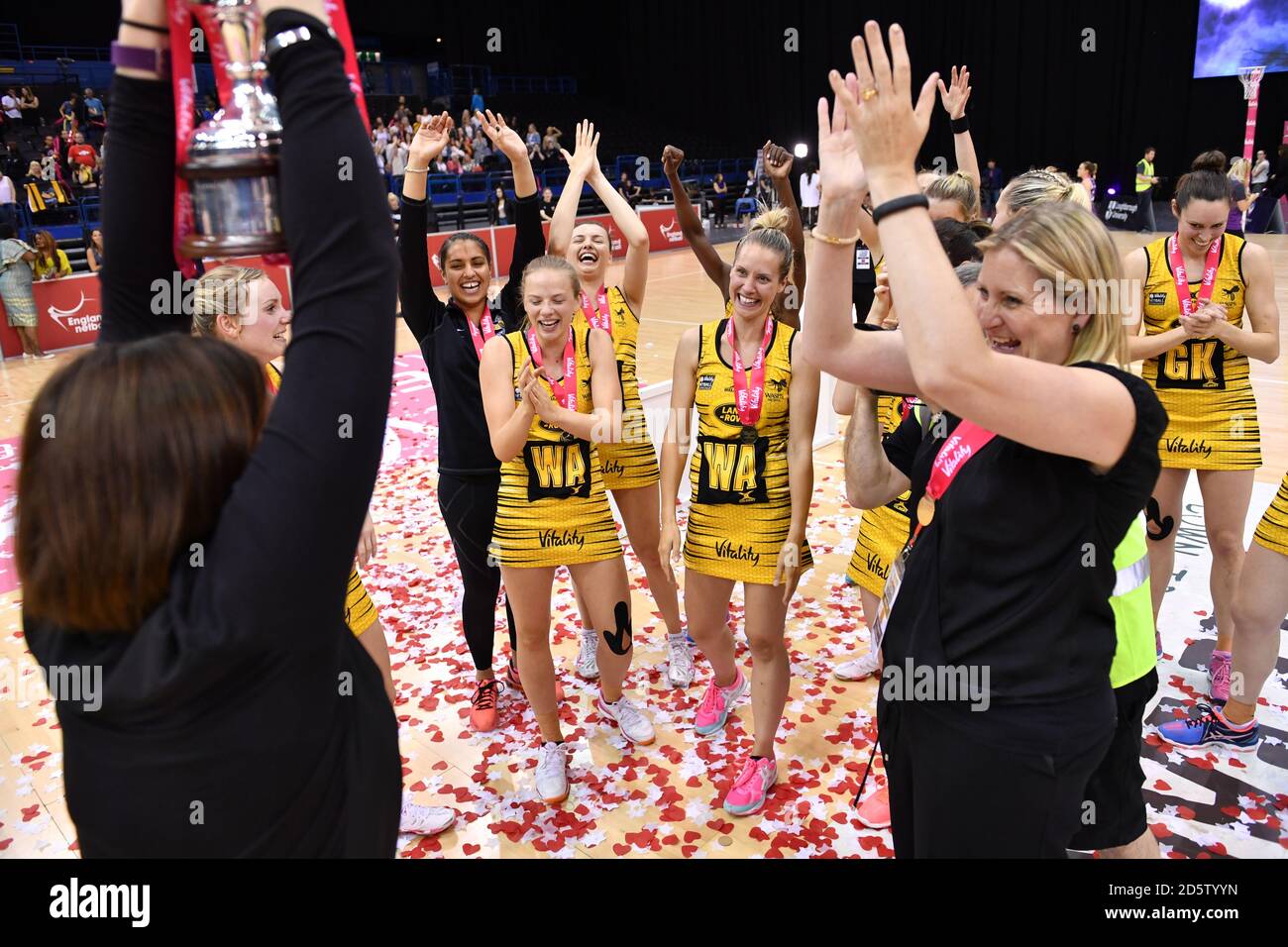 Wasps Netball players celebrate with the Trophy after winning the ...