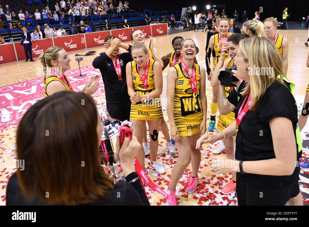 Wasps Netball players celebrate with the Trophy after winning the ...