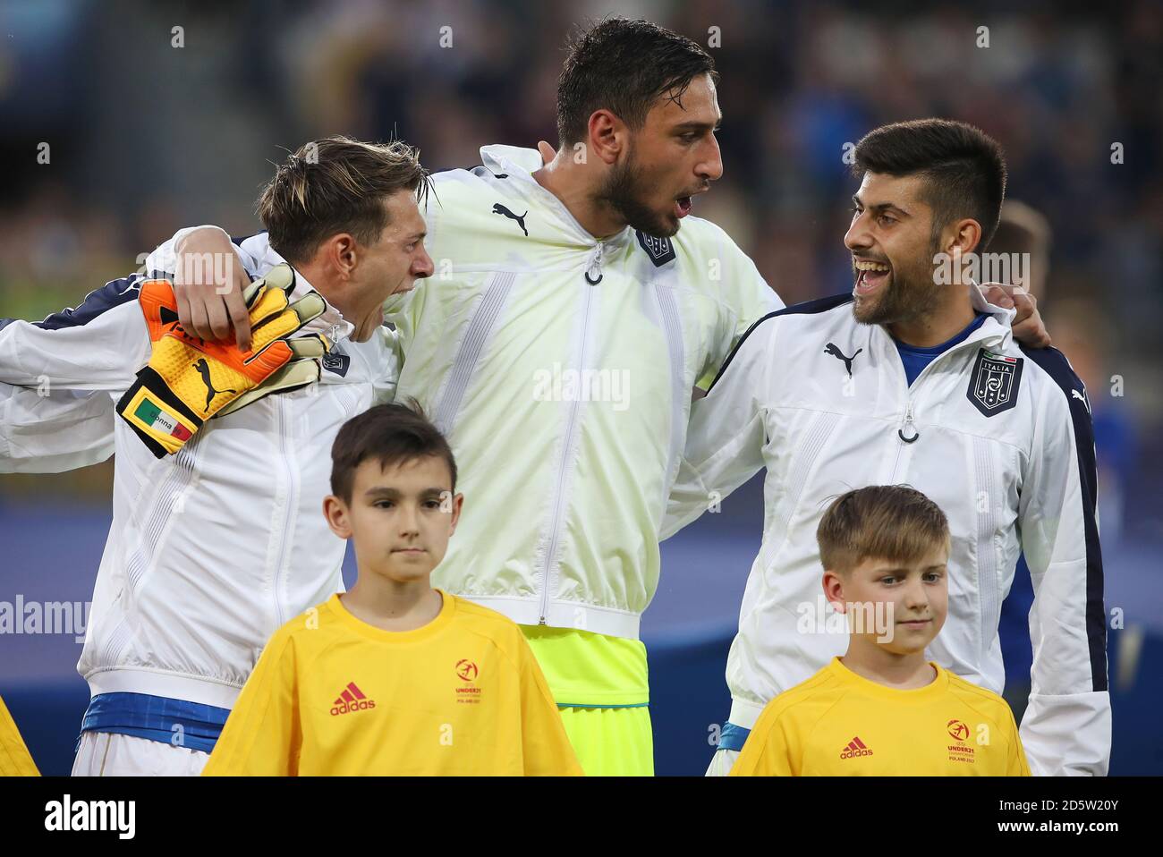 Italy's Federico Bernardeschi (left), Gianluigi Donnarumma (centre) and ...