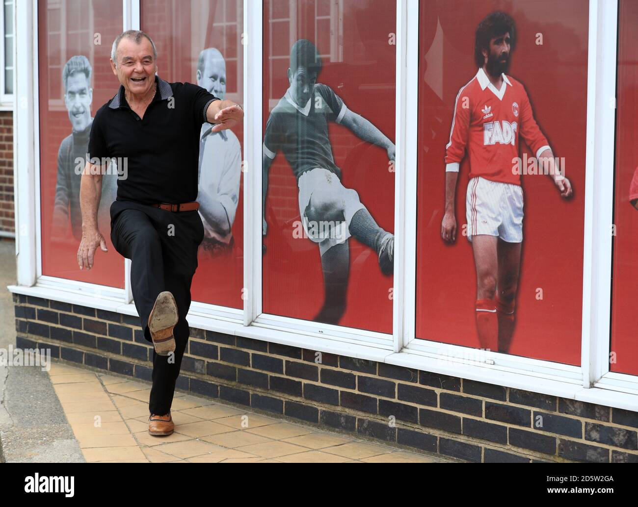 Charlton Athletic's Keith Peacock beside a photograph of himself outside of the training ground ...