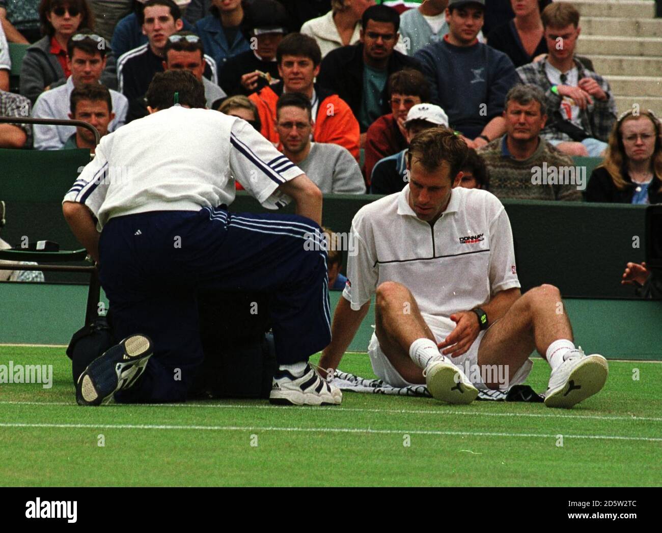 Greg Rusedski receives treatment from the physio Stock Photo - Alamy