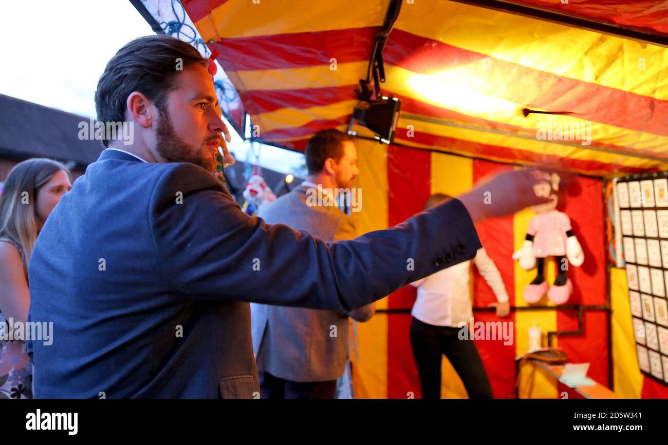 Guests enjoy the attractions at the MW Solicitors Summer Party held at ...