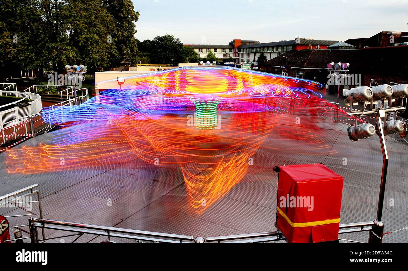 Guests enjoy the attractions at the MW Solicitors Summer Party held at ...