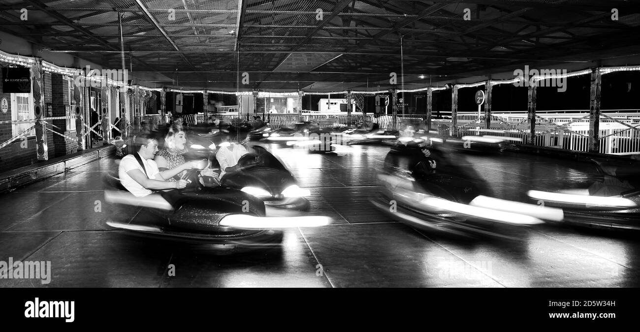 Guests enjoy the attractions at the MW Solicitors Summer Party held at ...