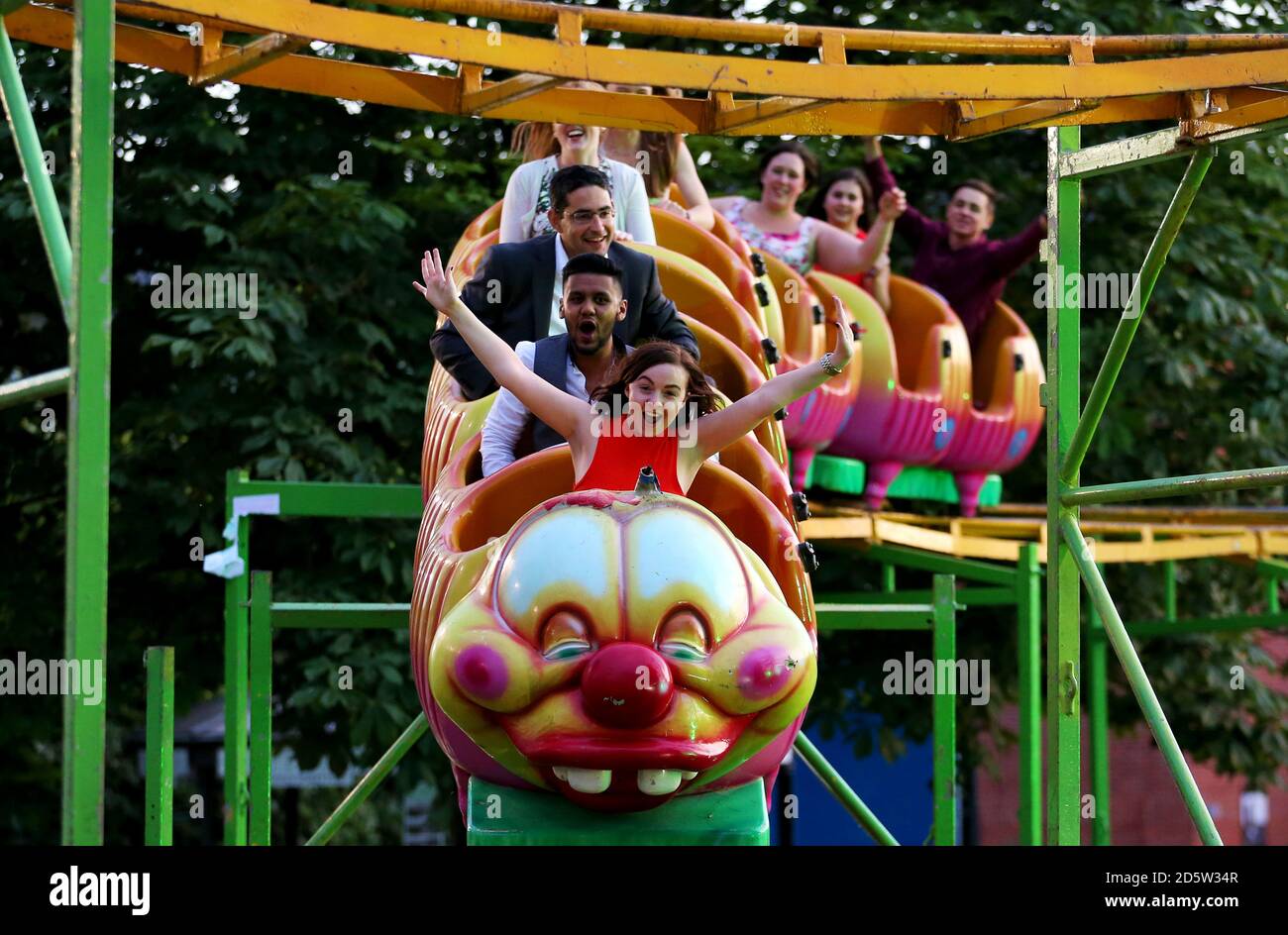 Guests enjoy the attractions at the MW Solicitors Summer Party held at ...