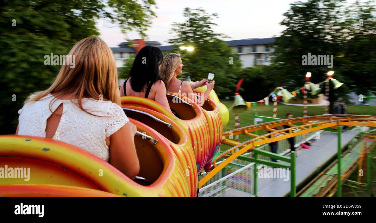 Guests enjoy the attractions at the MW Solicitors Summer Party held at ...