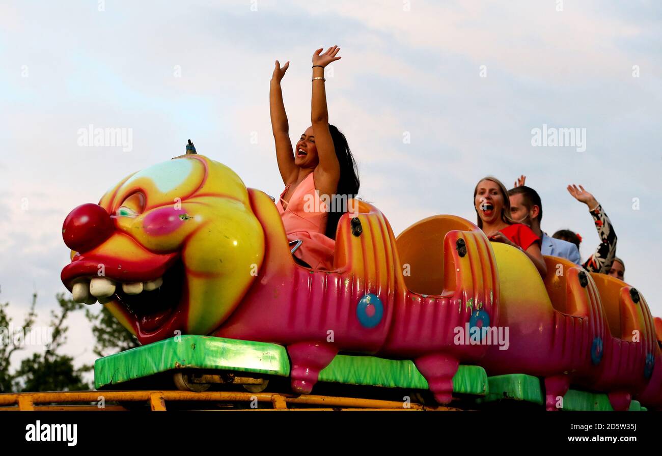 Guests enjoy the attractions at the MW Solicitors Summer Party held at ...