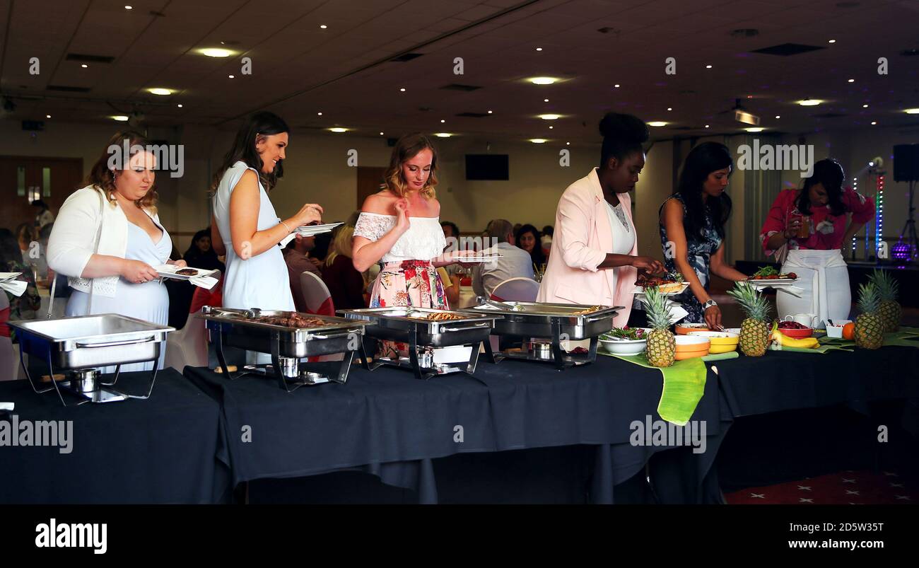 Guests enjoying a buffet at the MW Solicitors Summer Party held at ...