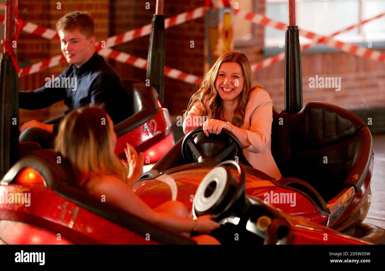 Guests enjoy the attractions at the MW Solicitors Summer Party held at ...